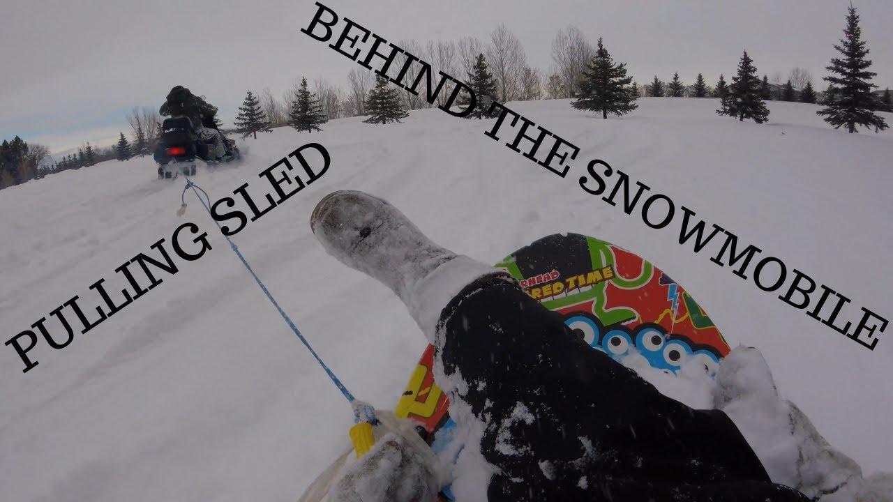 PULLING SLED BEHIND SNOWMOBILE! - YouTube