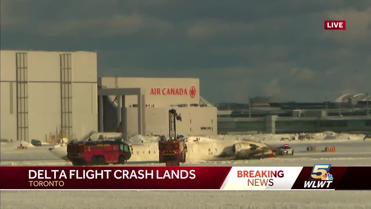 Delta flight crash lands at Toronto airport - YouTube