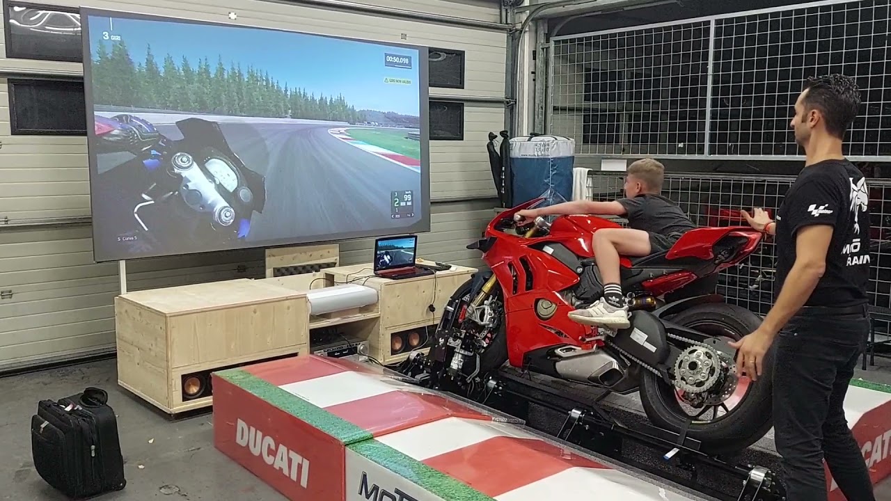 Young kid rides a Ducati Panigale V4s at Brno Circuit on Moto Trainer ...