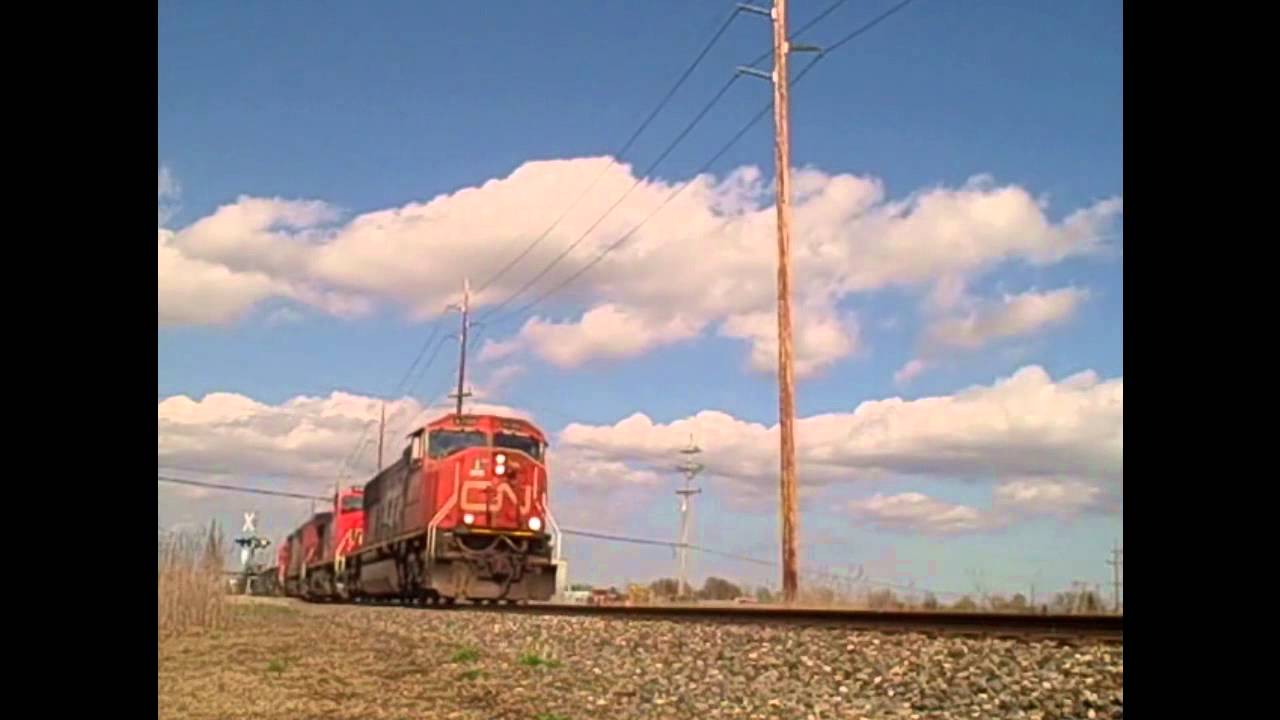 CN 5750 Leads CN 2412 CN 2152 & GTW 4903 Southbound - YouTube