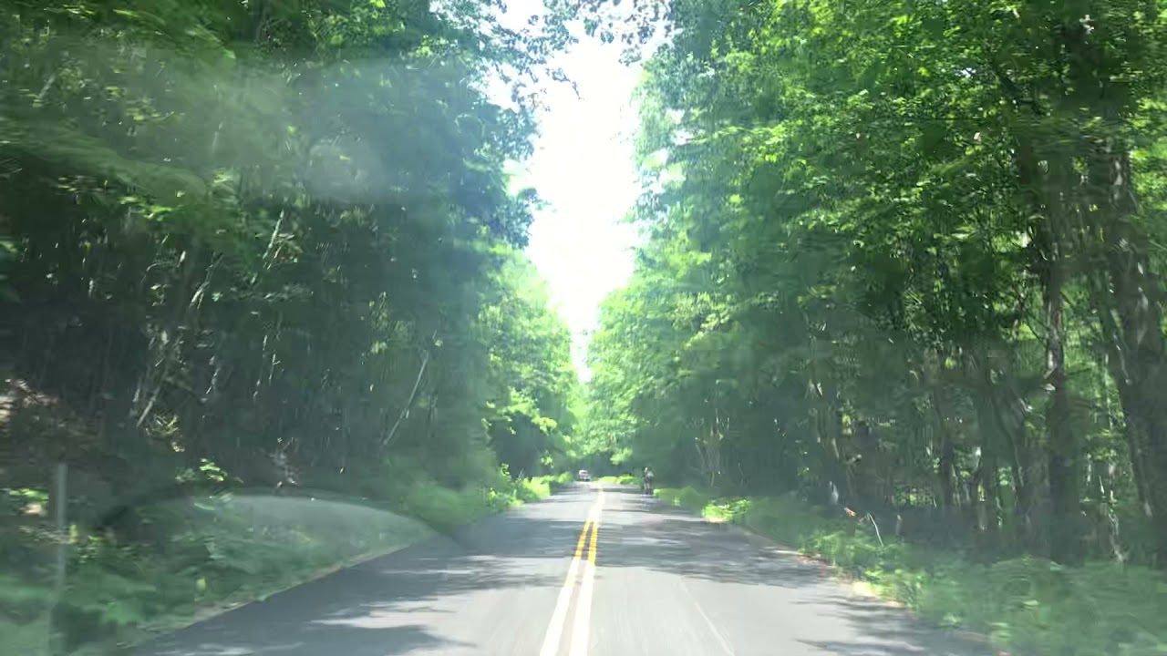 Driving along Bear Notch Road in the White Mountains of New Hampshire ...