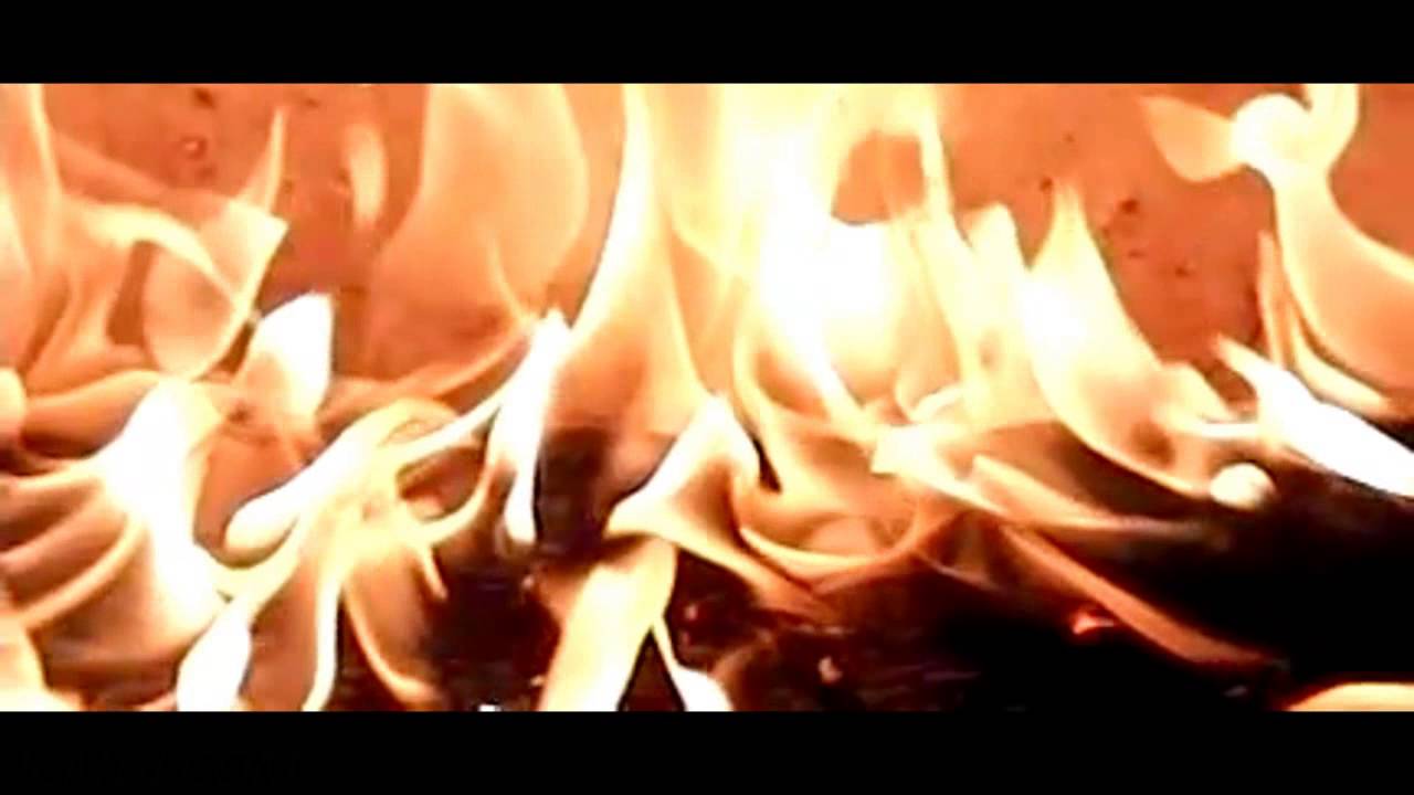 Long bright slow motion Lapping wavy flames wood and brick 600fps ...