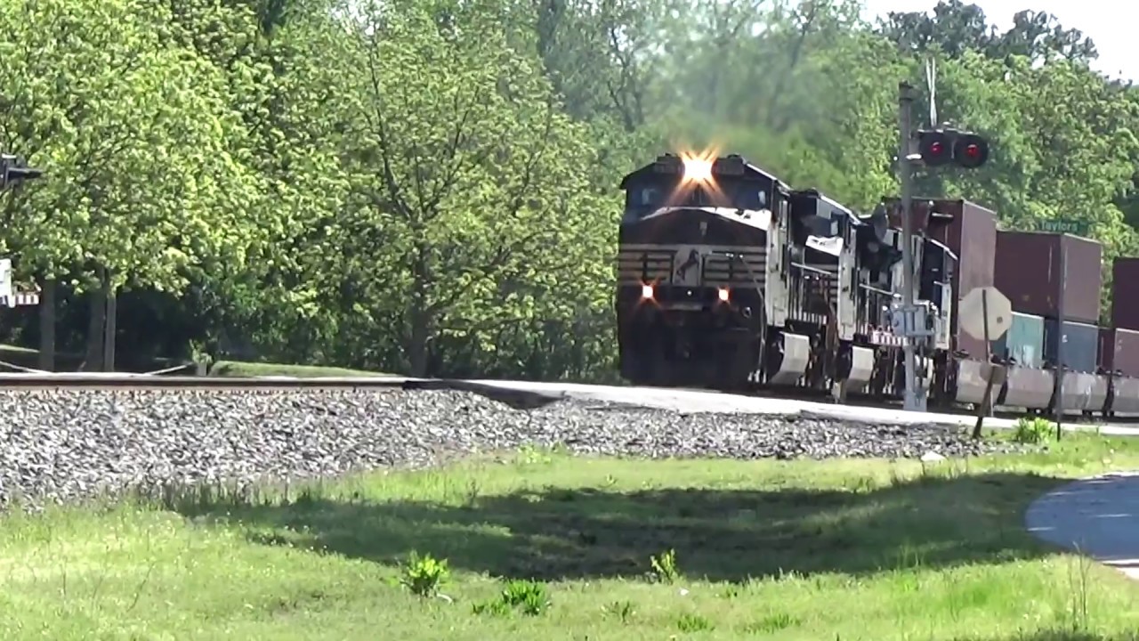 NS 237 Intermodal by Taylors Dash 9 pulls. another Dash 9 and ES44DC in tow short train 5-2-20 ...