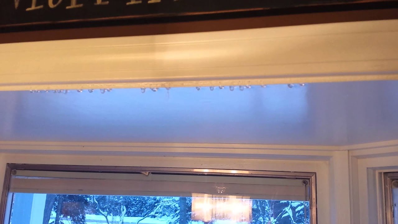 Inside water leak from ice dam - YouTube