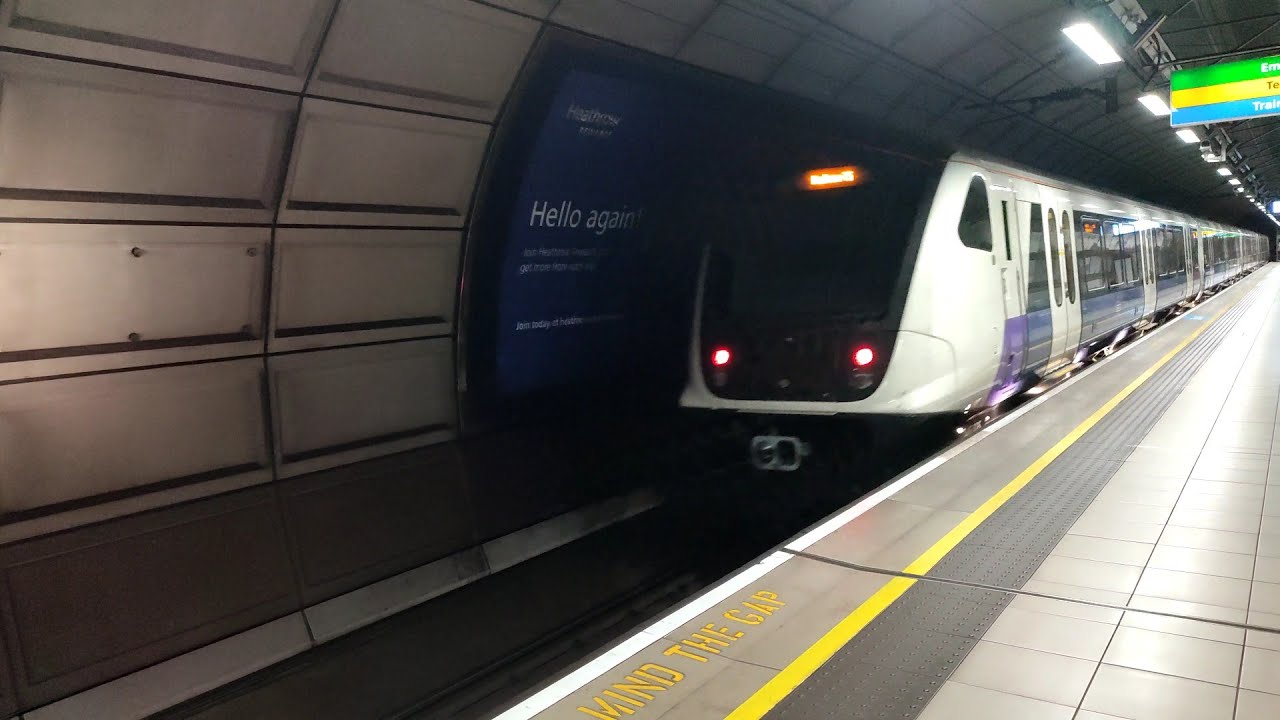 345 de la Elizabeth Line de Londres saliendo de Heathrow Terminals 2&3 ...