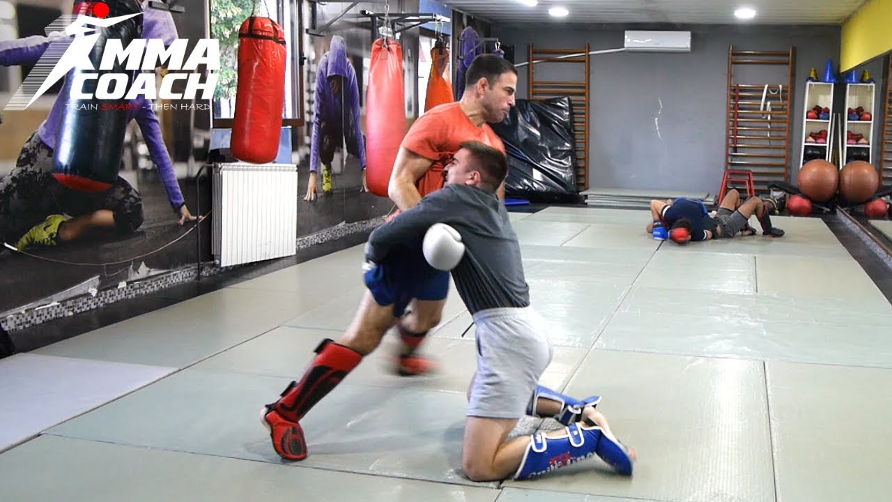 44-year-old MMA coach spars 20-year-old prospect - YouTube