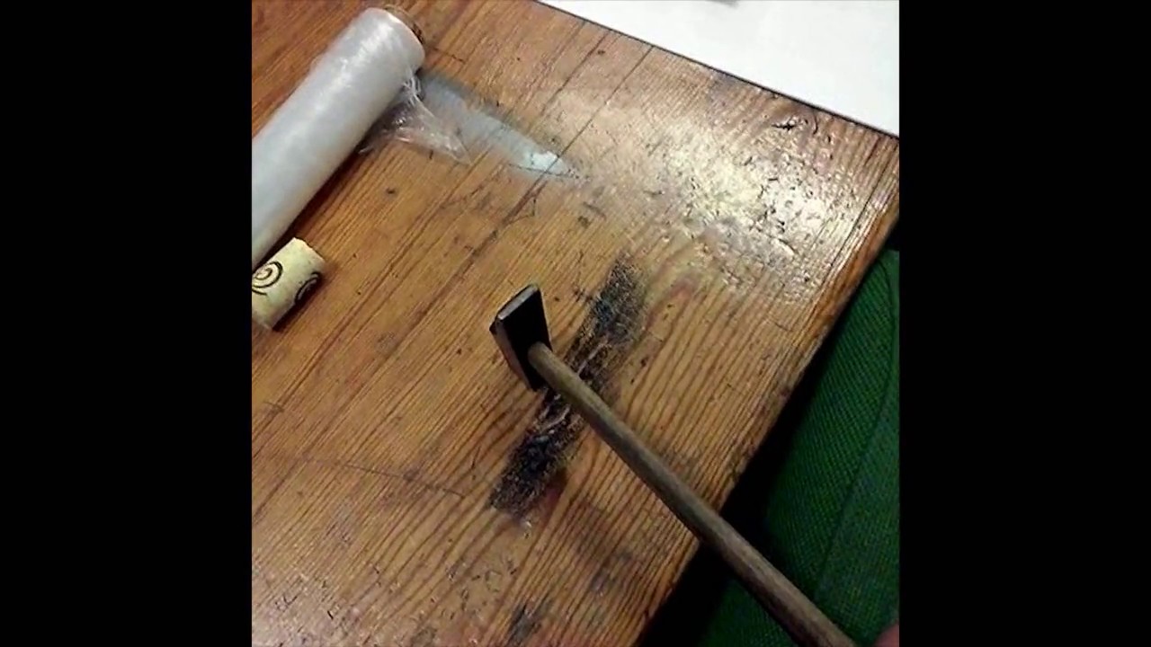An ordinary hammer smashing an ordinary table - YouTube