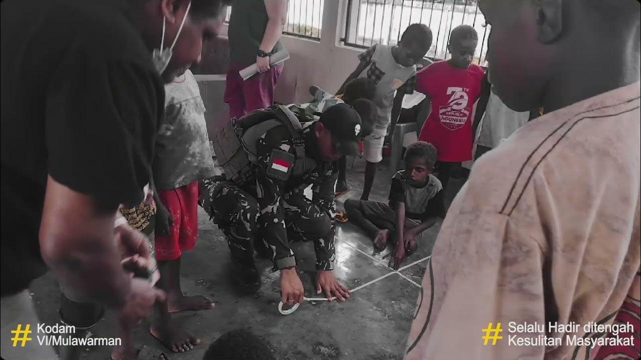 Satgas Yonif 611/Awang Long Berikan Pelayanan Kesehatan di Papua - YouTube