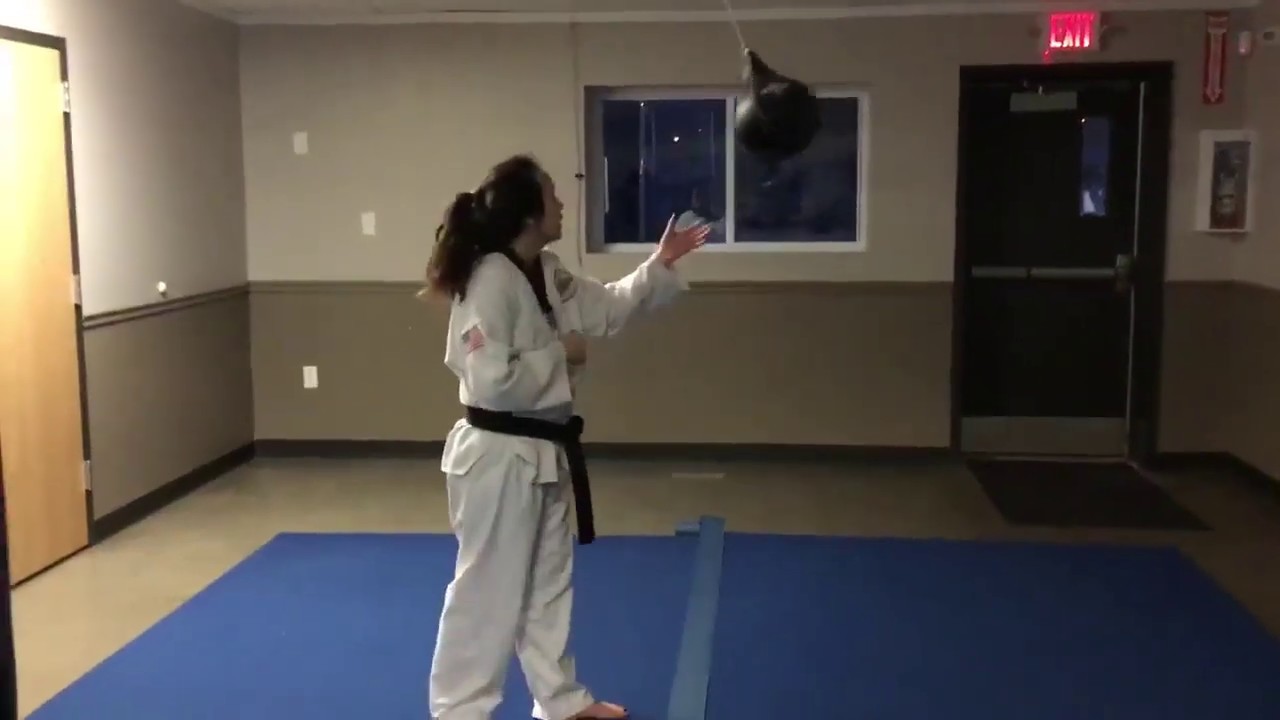 Taylor Nguyen demonstrating a Wheel Kick to a moving target - YouTube