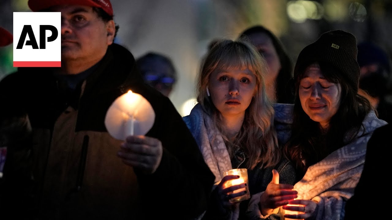 Kansas City holds vigil for victims of Chiefs parade shooting - YouTube