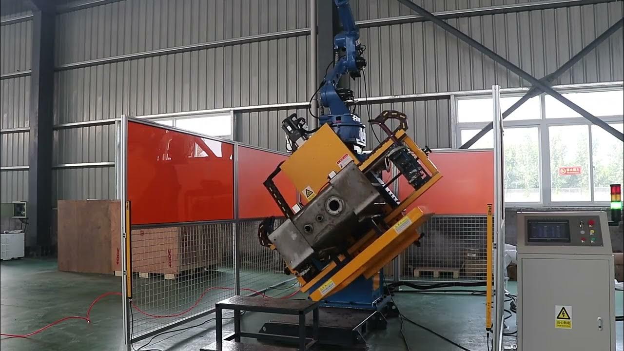How Yaskawa robot working with rotary welding table - YouTube