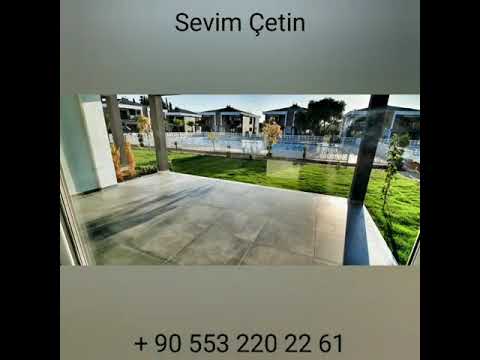 Kuşadası sahil sitelerinde havuzlu denize 700metre 4+1 3banyo 220m2 büyük Bahçeli Satılık Villa