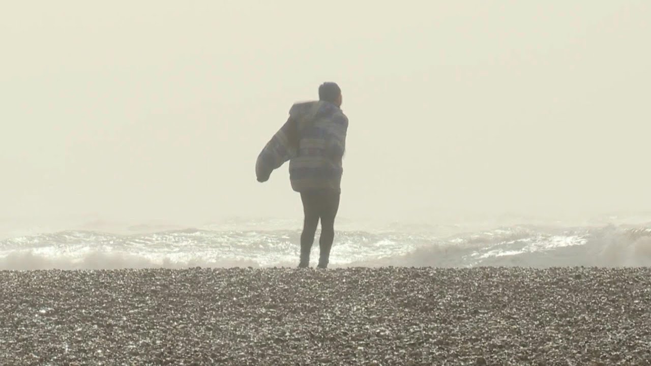 Beachgoers brave Brighton seafront despite Storm Eunice | AFP - YouTube