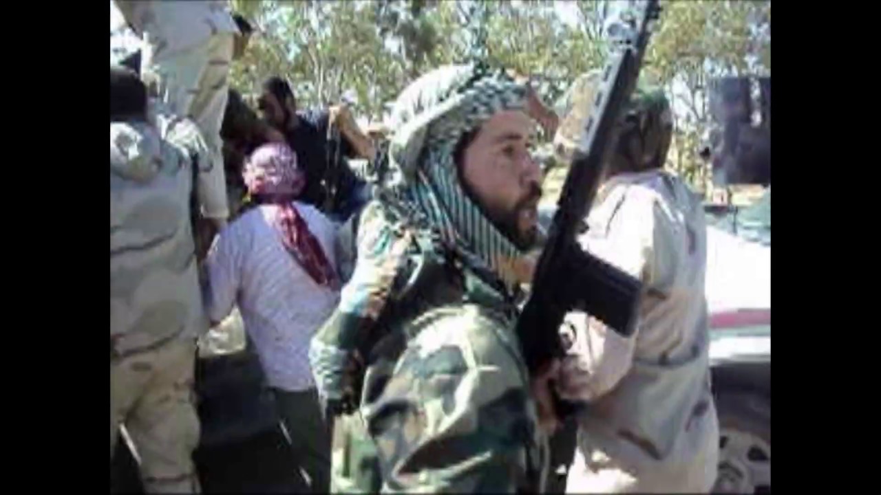 New footage of Gaddafi's capture (WARNING graphic images) - BBC ...