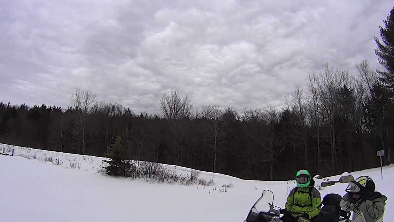 Snowmobile race on frozen lake - YouTube