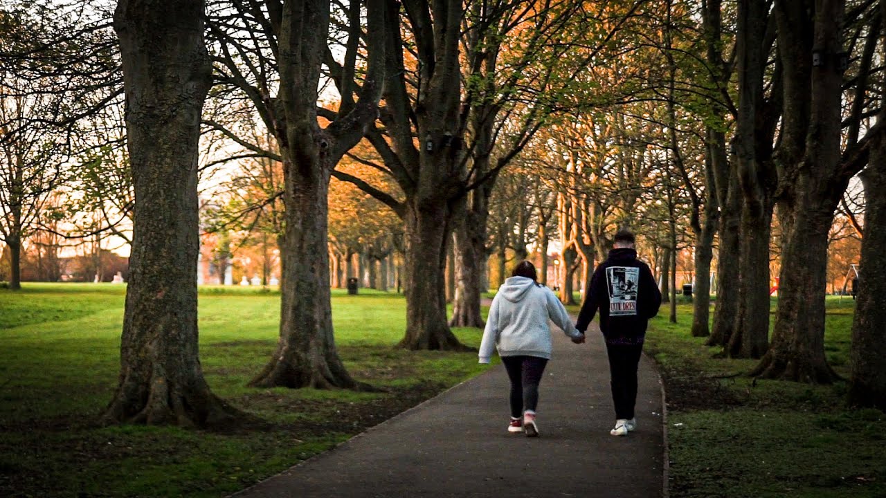 Couple Walking in a Park in the Morning - Stock Footage - YouTube
