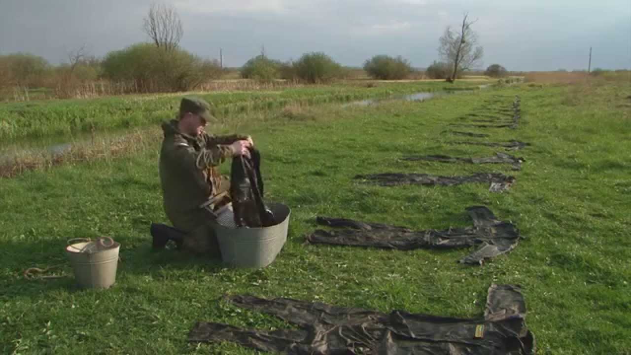 In Ukraine: Russian soldier is washing Ukrainian uniforms - YouTube