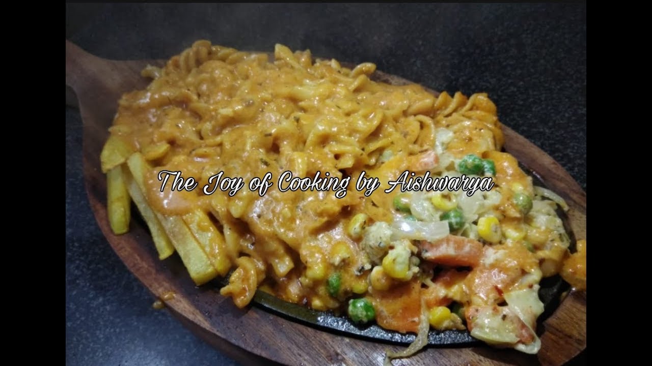 Pasta Sizzler | Homemade Pasta Sizzler | Pink Sauce Pasta Sizzler ...