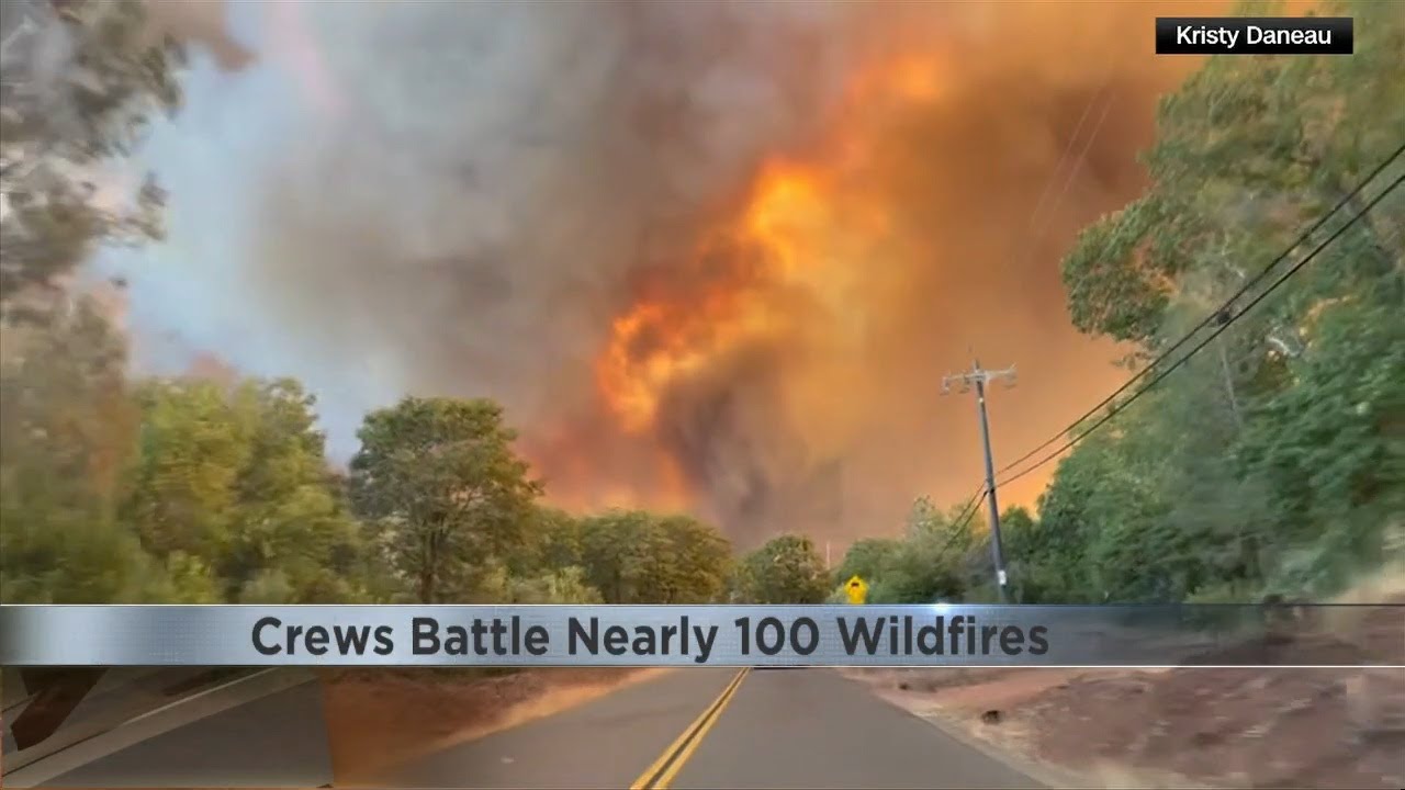 Nearly 100 large active wildfires rage in US - YouTube