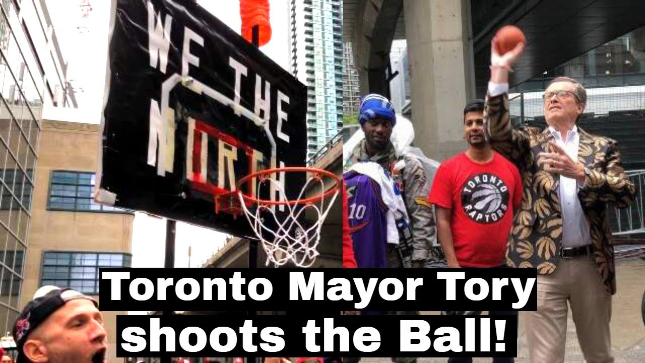 Toronto Mayor John Tory shoots the ball! Raptors fans cheer and line up ...