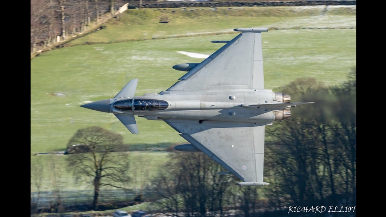 Two RAF Typhoon on a low level training sortie through Northern England ...