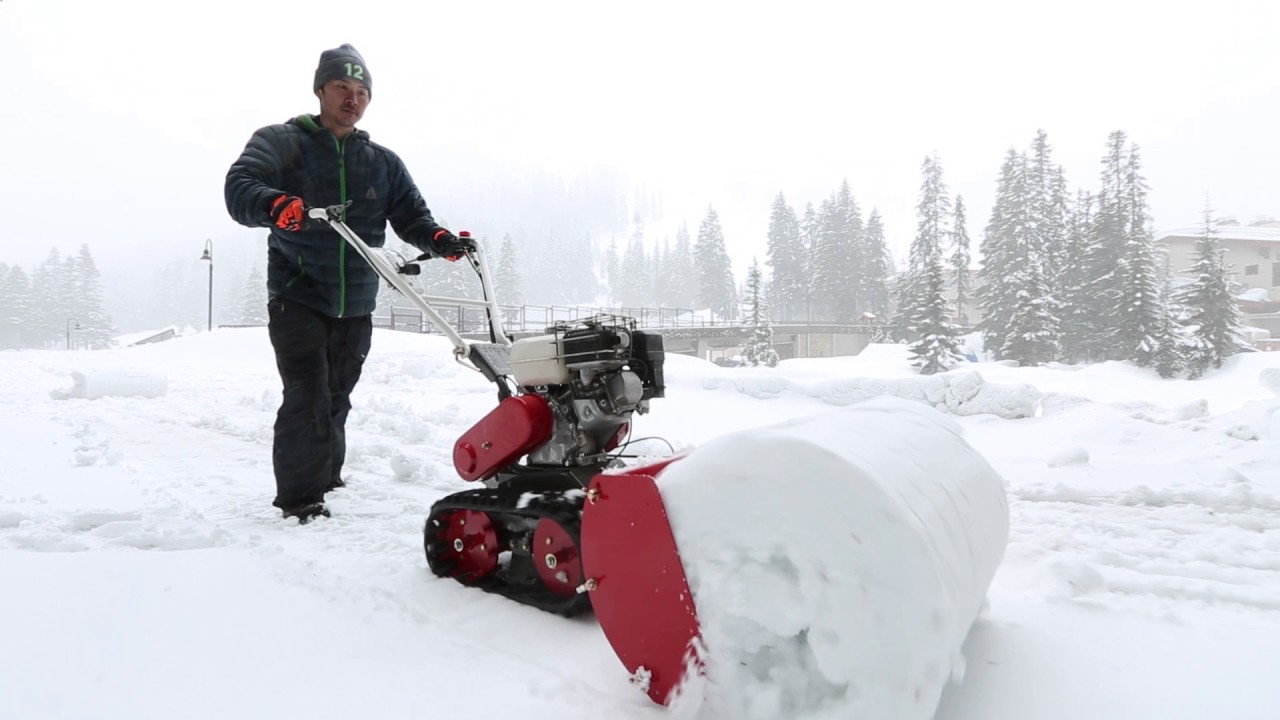 Rolling Up Snow with a Snow Bull - YouTube