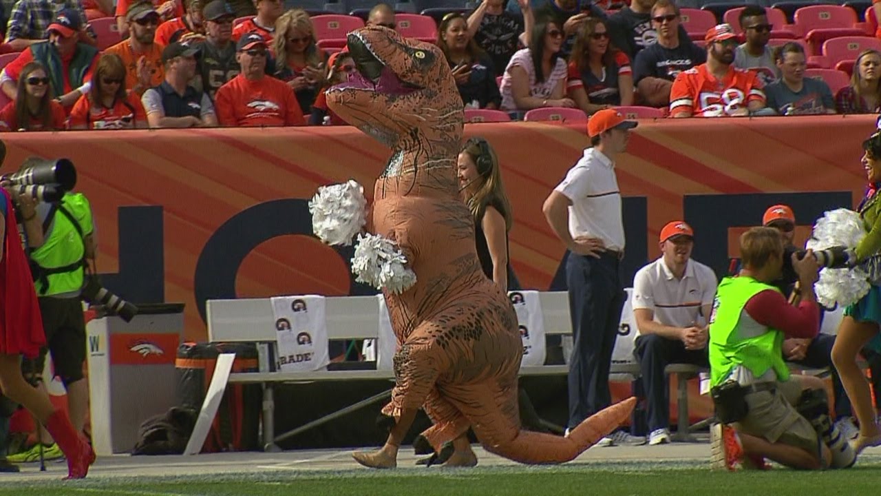 Broncos Cheerleaders Dresses Up As Dinosaur For Halloween - YouTube