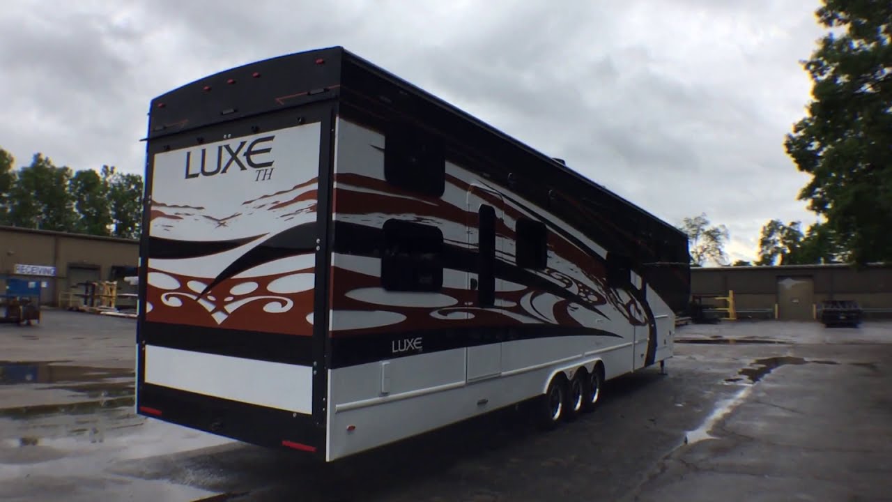 Luxe Toy Hauler 5th Wheel - Just back from paint - New Colors - YouTube