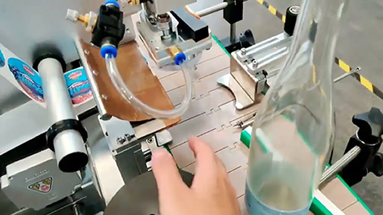 Compile videos: tutorial how to operate jars and bottles labeeling ...