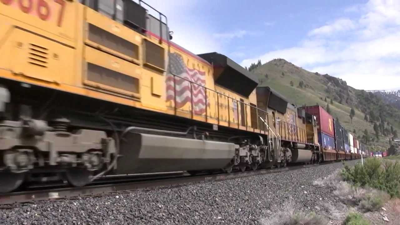 Union Pacific (UP) stack train crosses Truckee River at Quilici Ranch ...