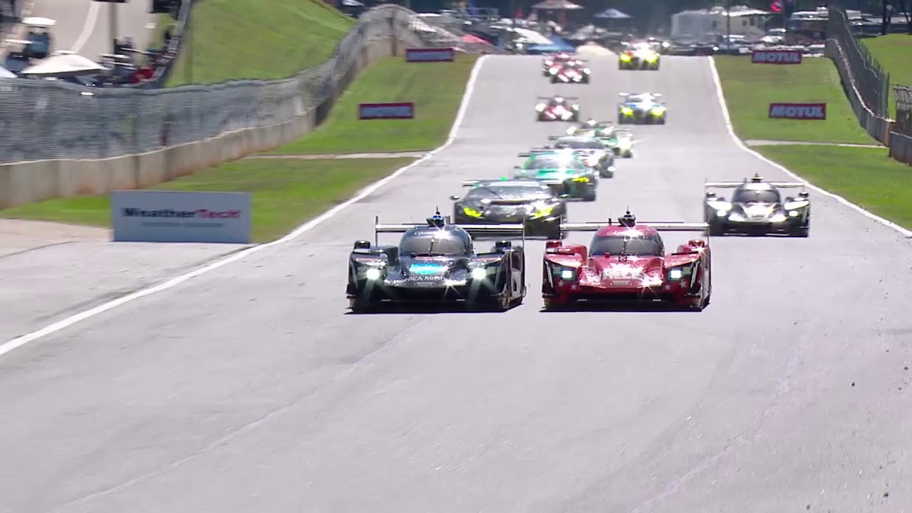 Eric Curran Doing Battle at Petit Le Mans - YouTube