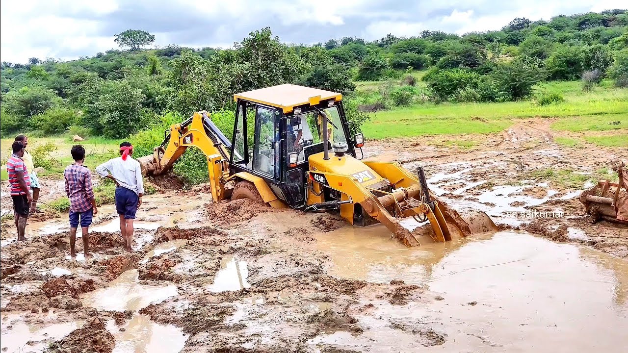 Cat jcb stuck in mud | jcb | | cat jcb | | jcb video | - YouTube
