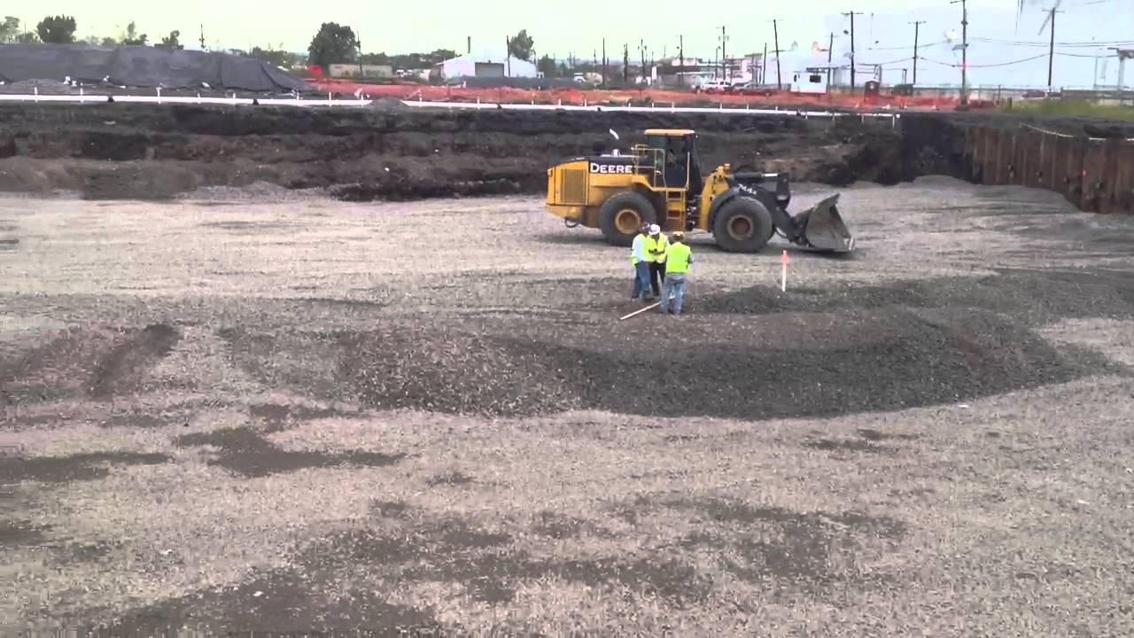 Backfilling excavation - YouTube