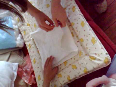 Learning a new nappy fold!! - YouTube