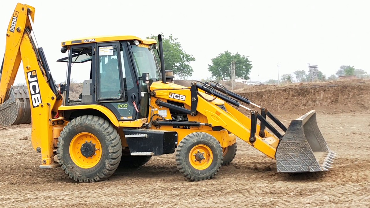 JCB Backhoe Loading Mud in Tractor - JCB Digging Home For Field ...