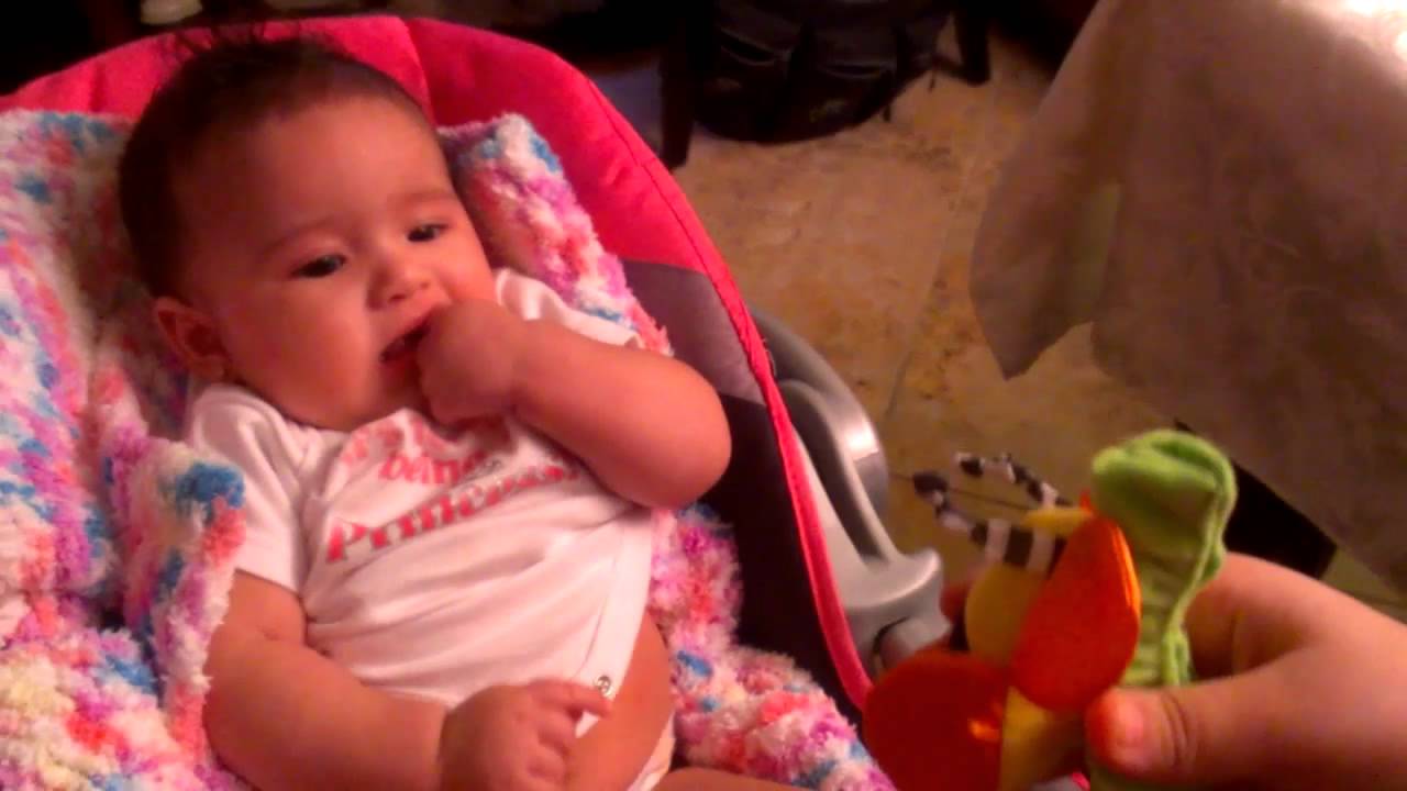 Baby Maya gets scared from squeeze toy - YouTube