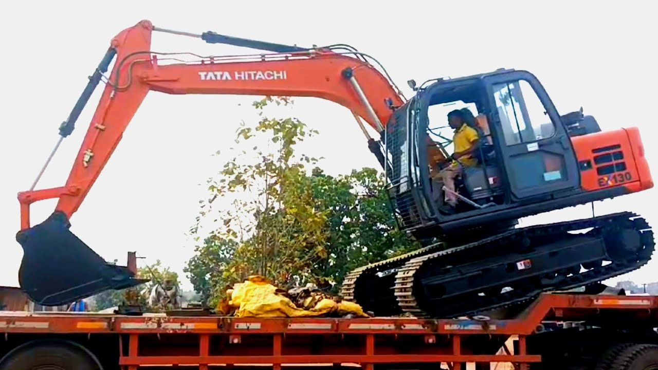 Excavator unload from a truck in a safe way || best excavator operator ...
