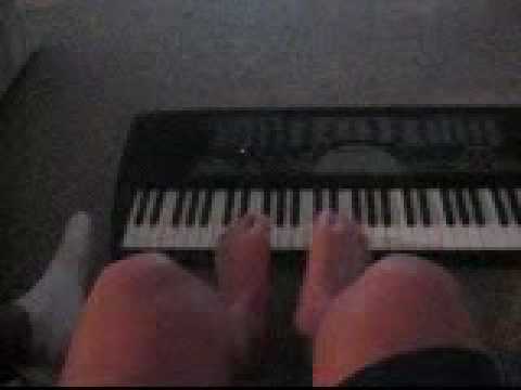 Man plays piano with feet AMAZING - YouTube
