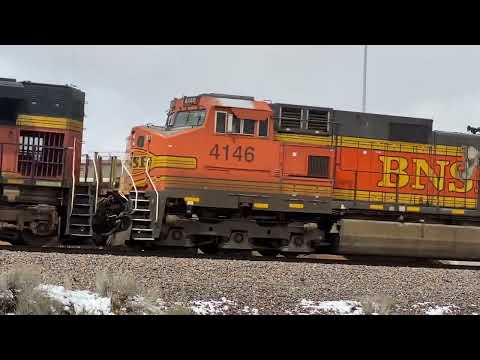 Railroad Train with many railcars covered with Spray Paint Graffiti Art ...