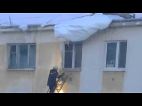 Fireman Knocked Down Ladder by Massive Chunk of Snow - YouTube