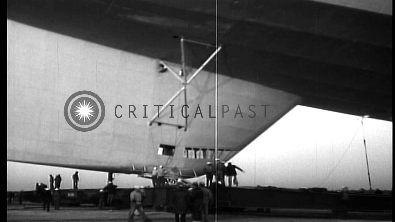 USS Akron (ZRS-4) Zeppelin Dirigible being moved to a mooring mast by ...