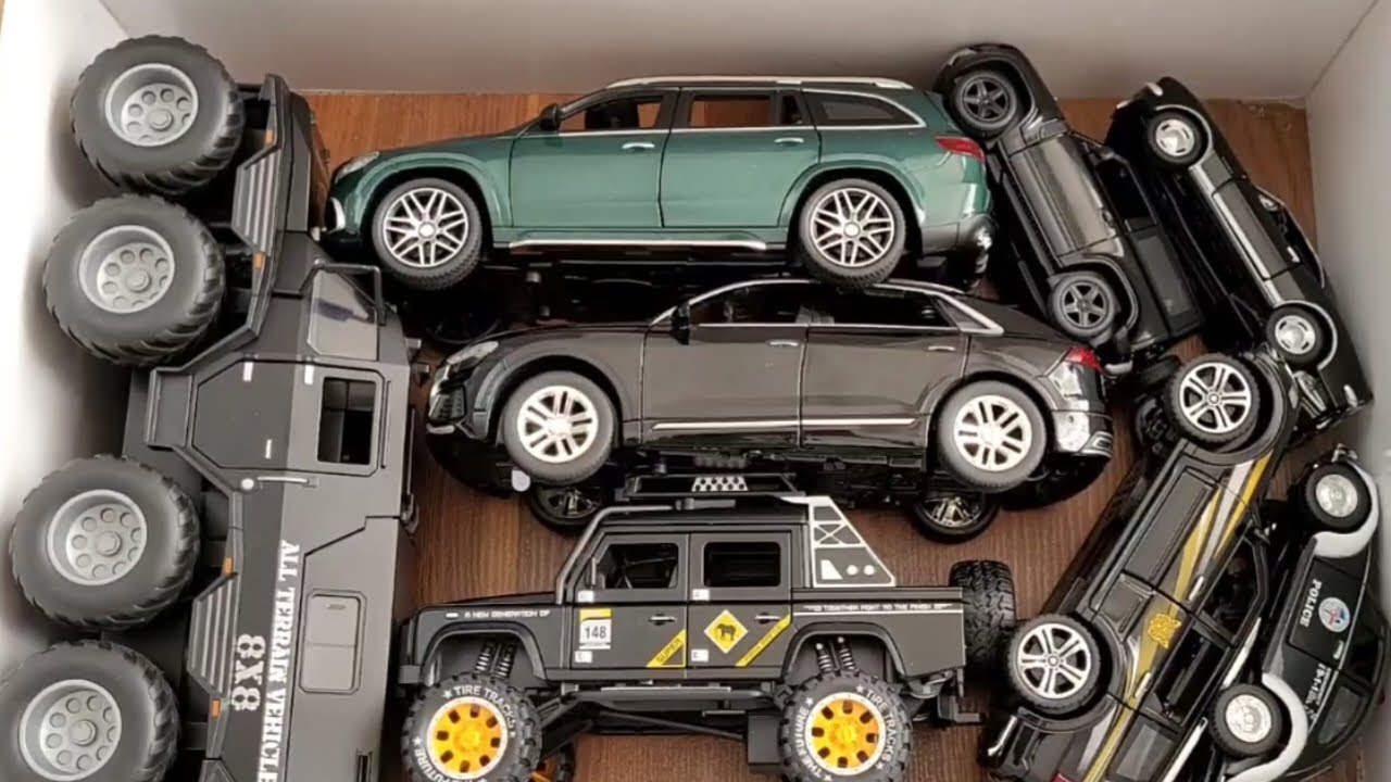 Box full off model cars,Land rover Defender,Mercedes GLS63,Avtros ...