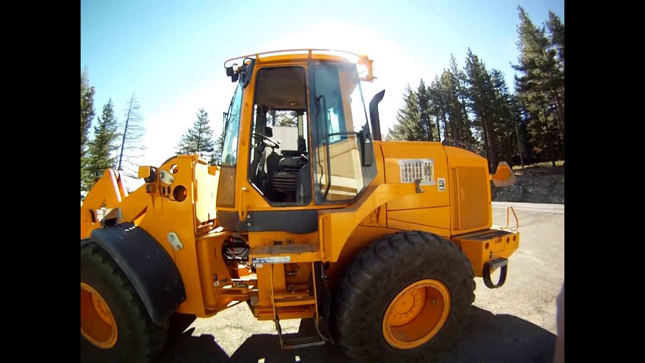 Loading 10-Wheel Dump Truck With A Front-End Loader - YouTube
