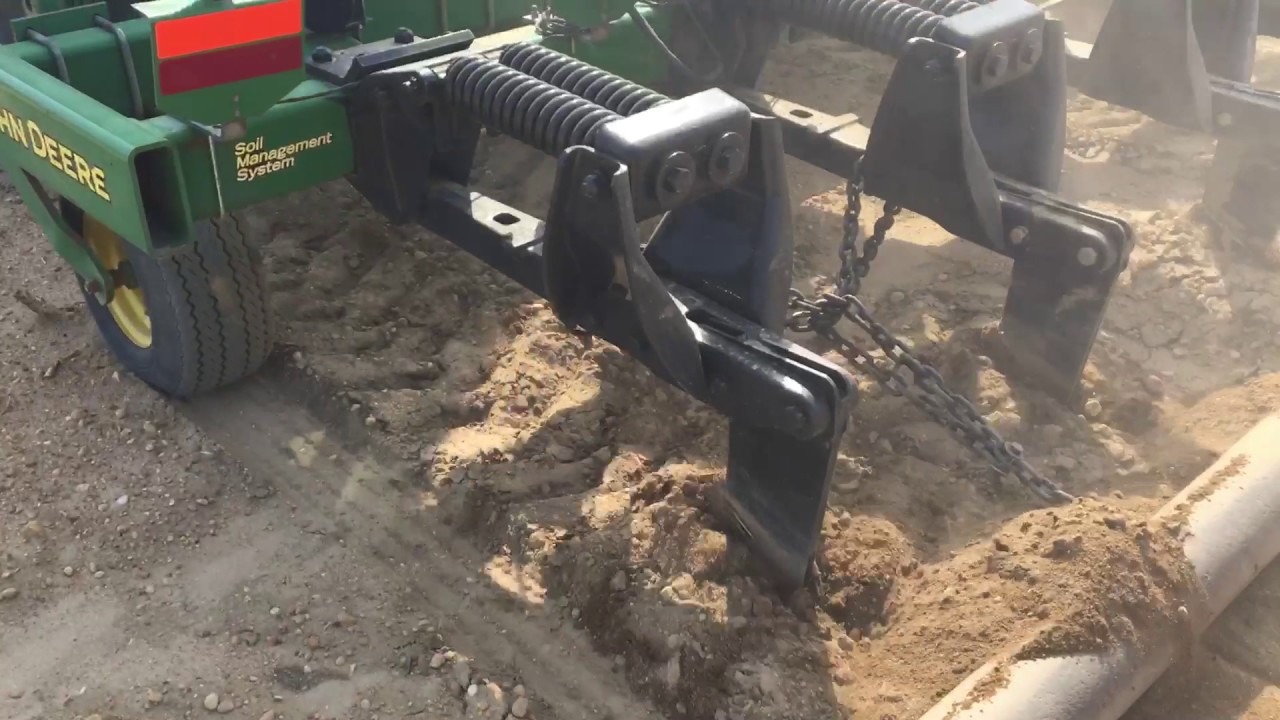 Case 225 Tractor pulling 5 Shank John Deere Subsoiler through hard ...