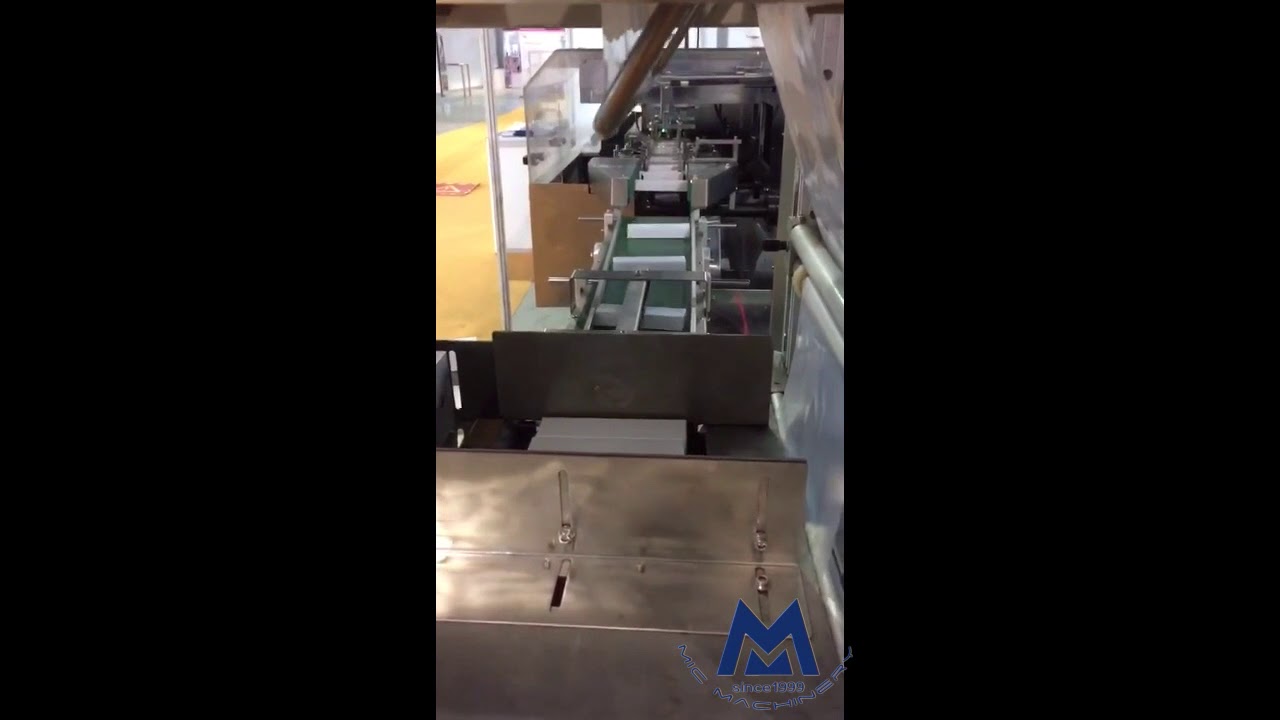 MIC Carton packing machine with film packing line - YouTube