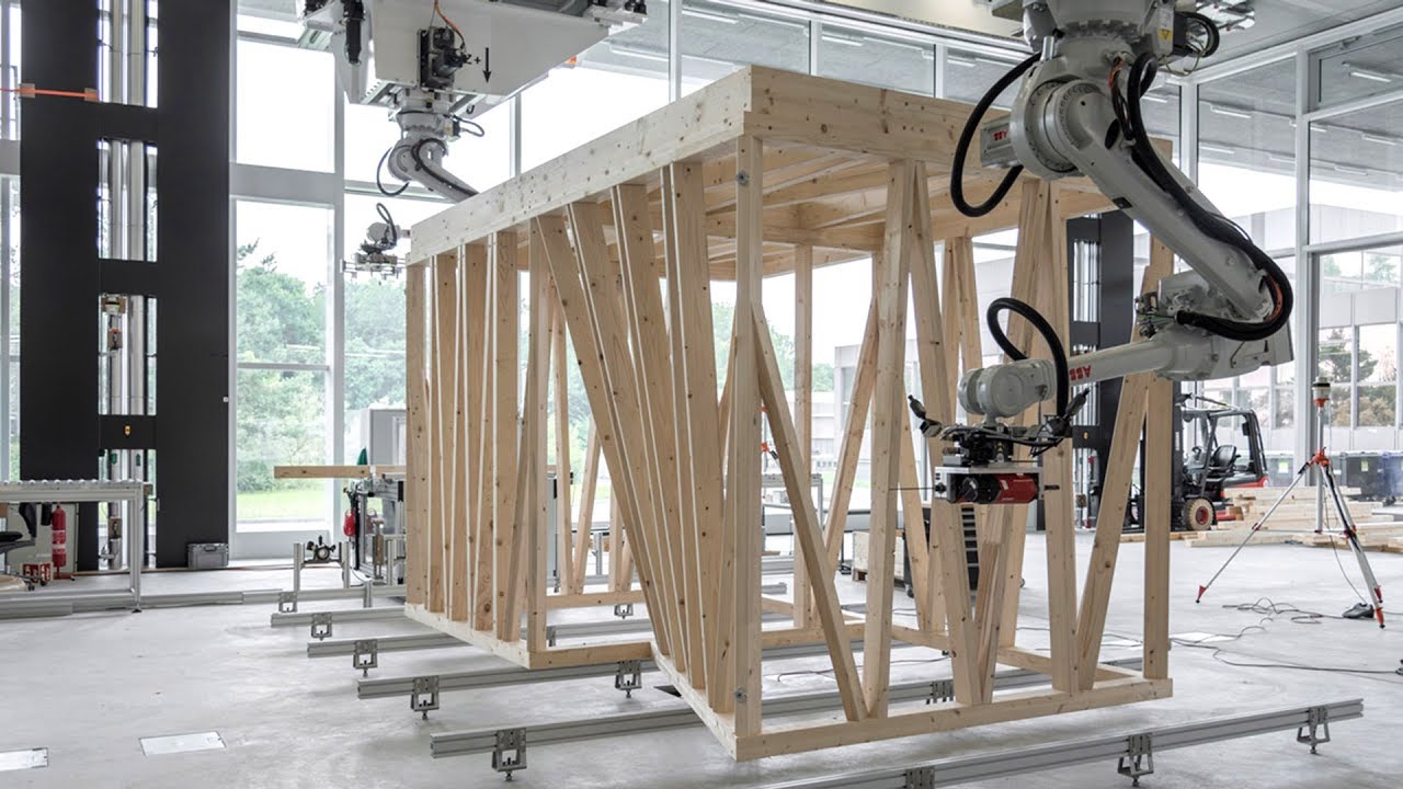 Roboter kooperieren im Holzbau - YouTube