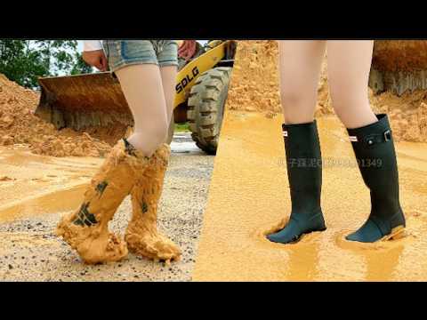 322期After the flood, I explored the muddy construction site wearing high-top rain boots.