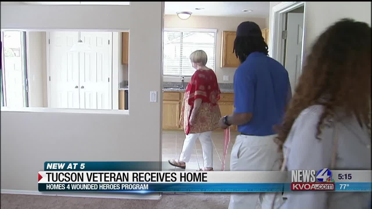 Army veteran receives new home - YouTube