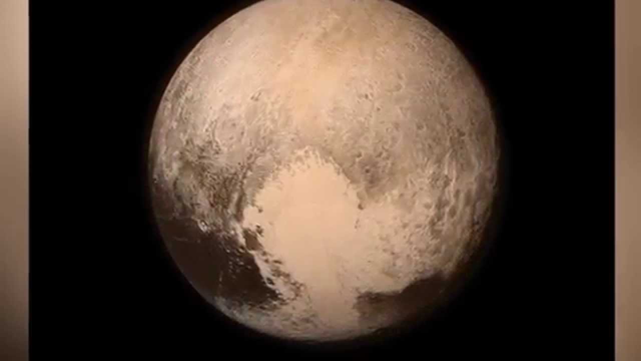 NASA images show Pluto up-close and personal for the first time - YouTube