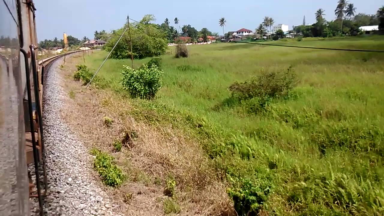KTM EAST COAST SHUTTLE ENTERING TUMPAT STATION - YouTube